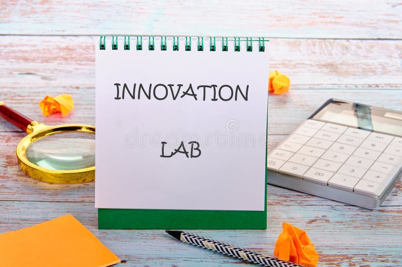 Innovation Lab Setup Featuring a Notebook, Calculator, and Creative ...