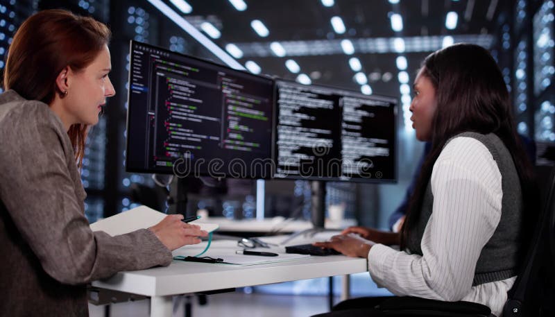 Innovative African Programmer Collaborating with Diverse Team Stock ...