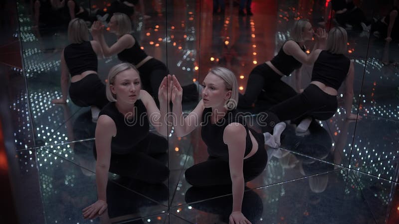 Innovative Dance Pose on Reflective Surface Demonstrates Contemporary ...
