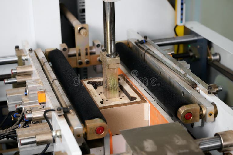 Innovative Machine Wraps Rectangular Boxes with Precision in Modern ...