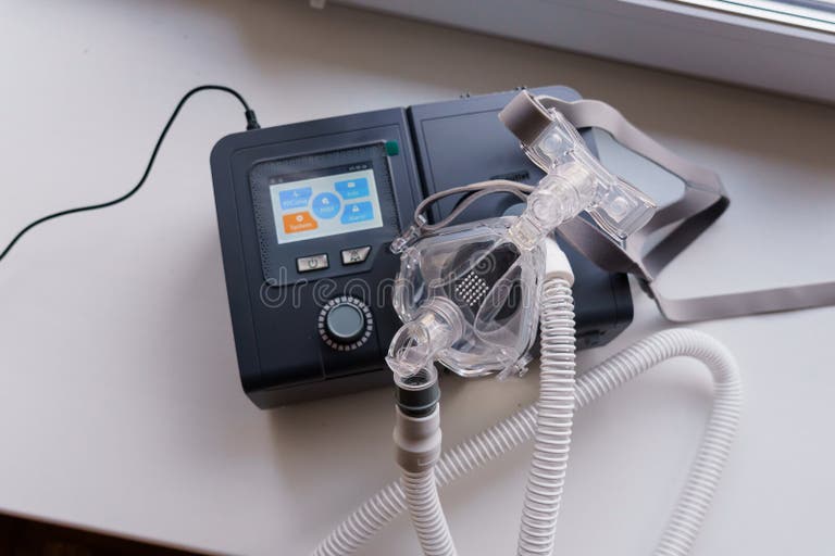 Innovative Portable Respiratory Device with Mask and Controls Stock ...