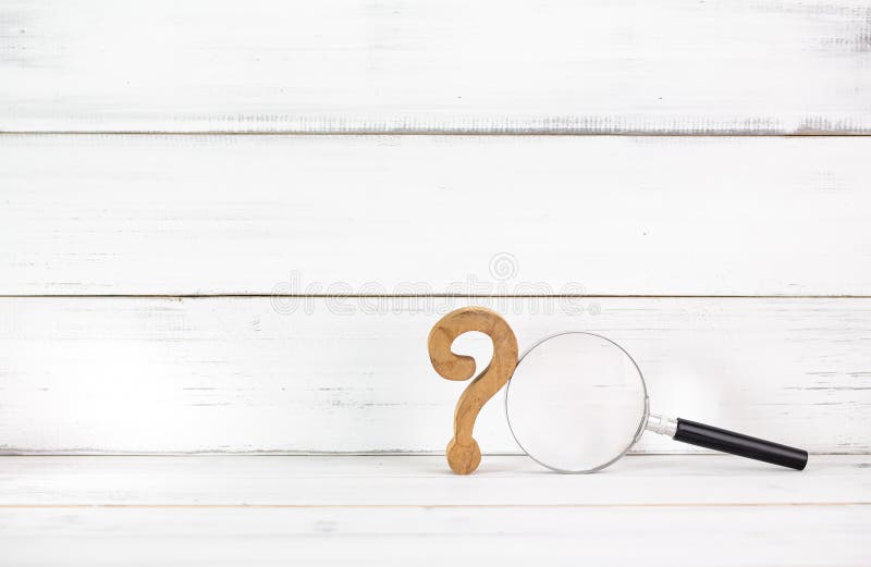 Inquisitive Search: Wooden Question Mark with Magnifying Glass on ...
