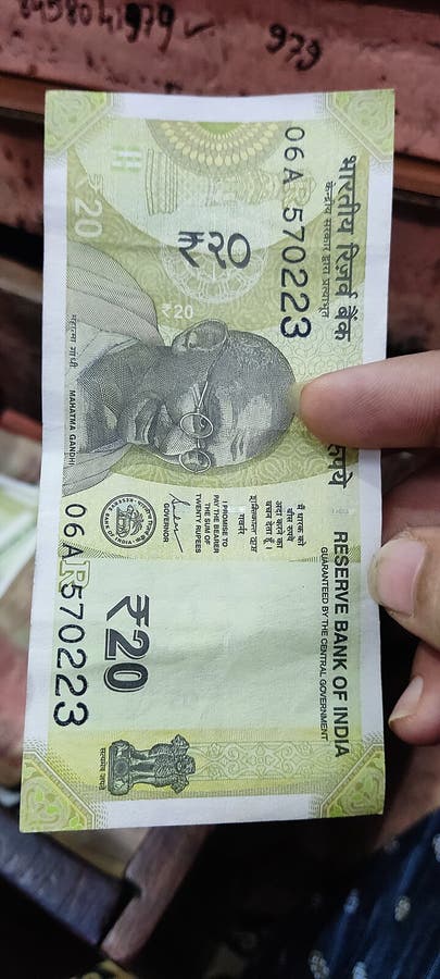 20 INR note held in hand stock photo. Image of indian - 224199822