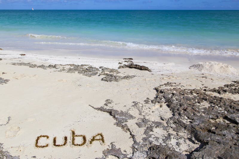 Inscription Cube on the Dense Sand of the Beach. Stock Photo - Image of ...