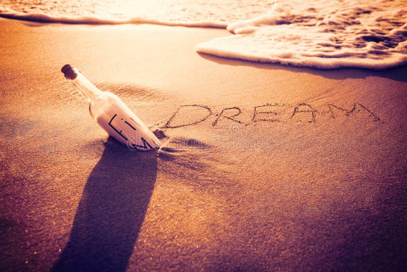 Inscription dream on sand stock photo. Image of copy - 56683732