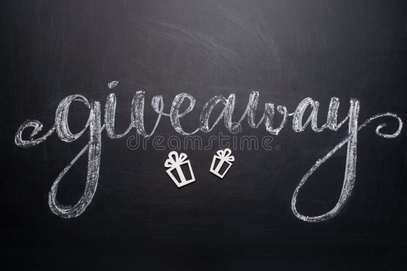 Inscription Giveaway Written on the Board with Gifts Stock Image ...