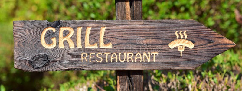 The Inscription Grill on a Wooden Pointer on the Territory of the Hotel ...