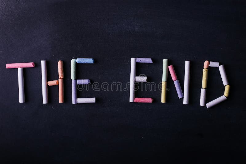 The Inscription is Lined with Multicolored Chalks on a Black Chalkboard ...