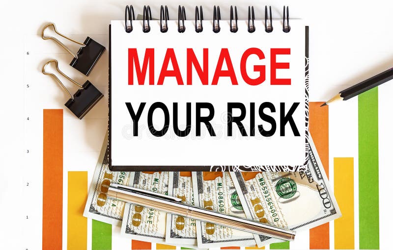 Inscription MANAGE YOUR RISK in Notebook, Concept of Planning, with ...