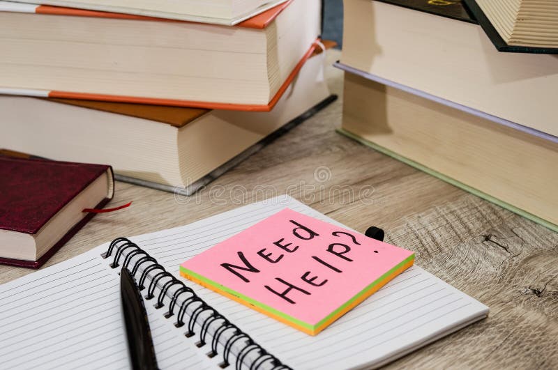 Inscription Need Help on the Sticker and Stacks of Books on the Table ...