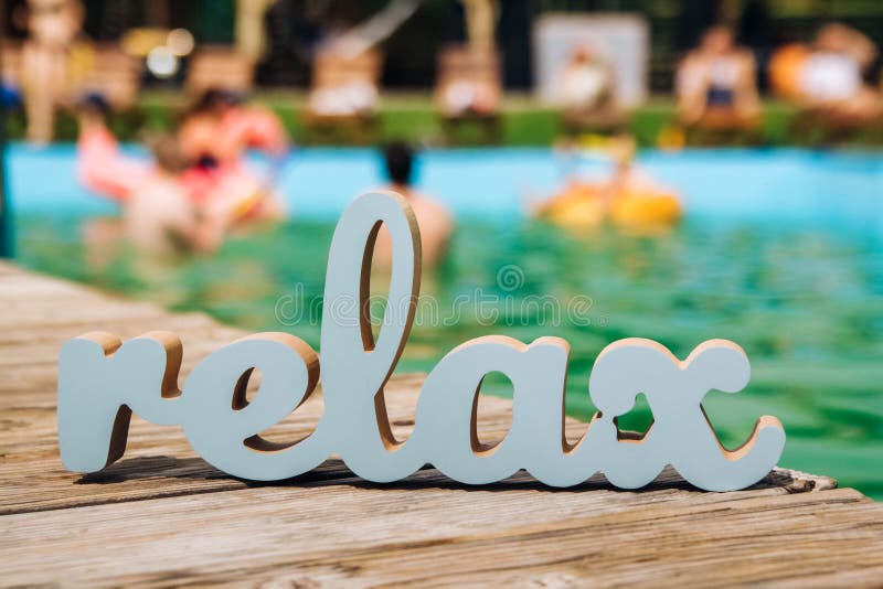 Inscription Relax Blue in Blurred Pool Background Stock Photo - Image ...