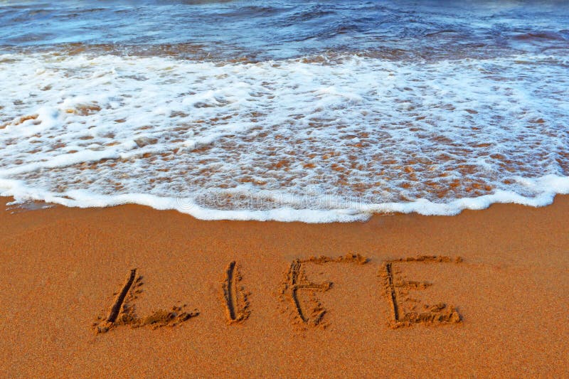 Inscription on sand: life stock photo. Image of writing - 32642532