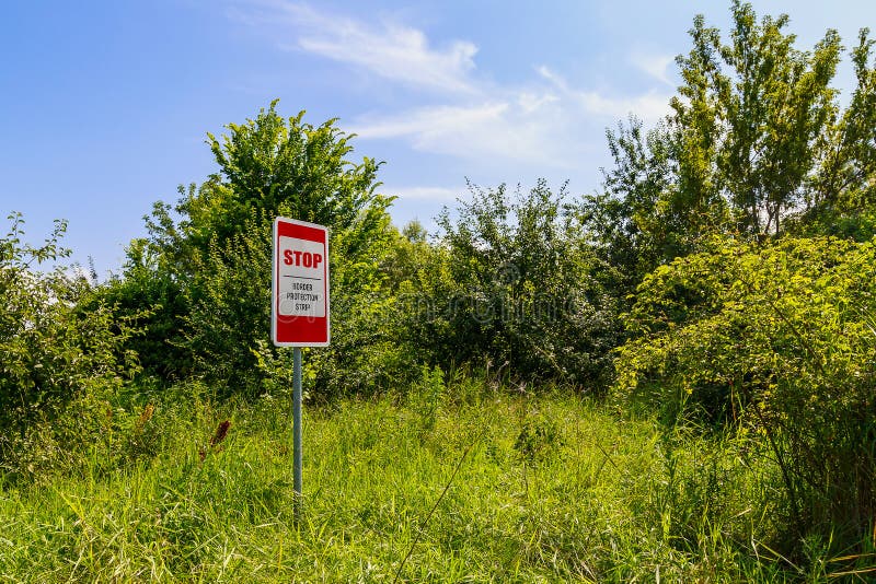 The Inscription or Text in English STOP BORDER PROTECTION STRIP ...