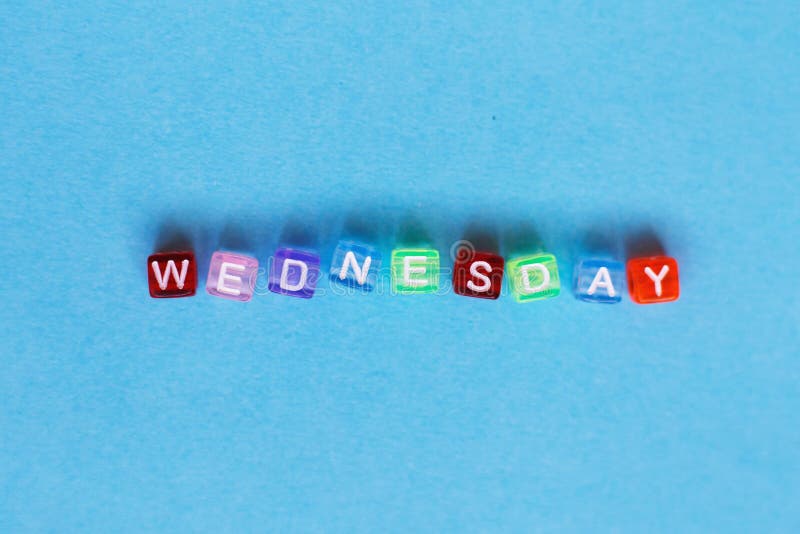 Inscription Wednesday Made by Multicolor Plastic Cubes on a Blue ...