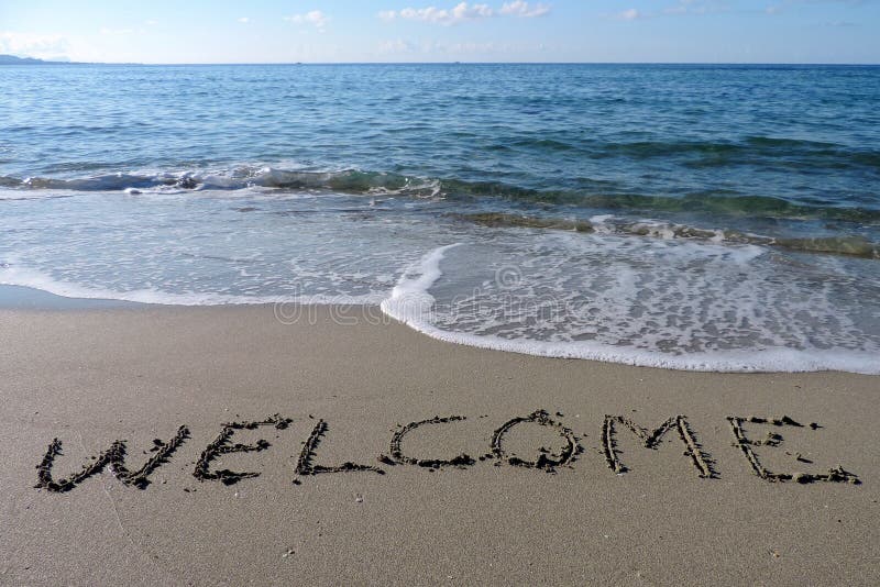 Inscription Welcome on Wet Sand. Stock Photo - Image of abstract ...