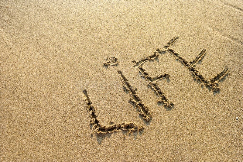 Inscription on the Wet Sand Life, Footprints in the Sand Stock Photo ...