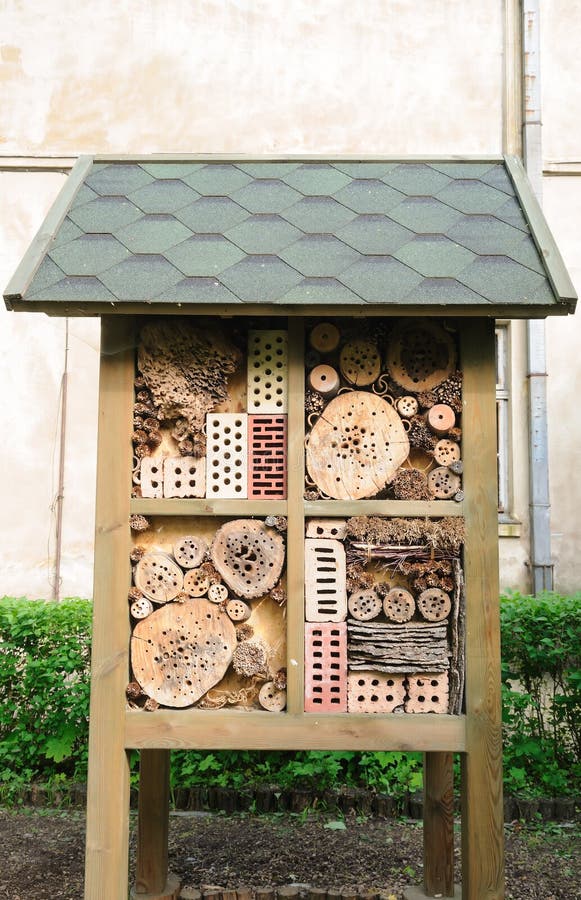 Insect hotel in garden stock image. Image of gardening - 54510893