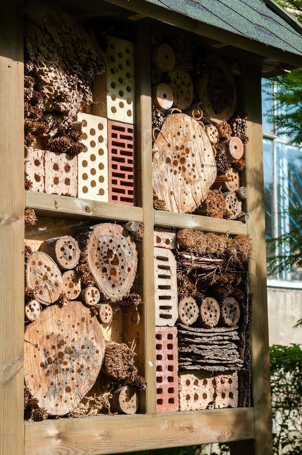 Insect hotel in garden stock image. Image of outdoor - 55764643