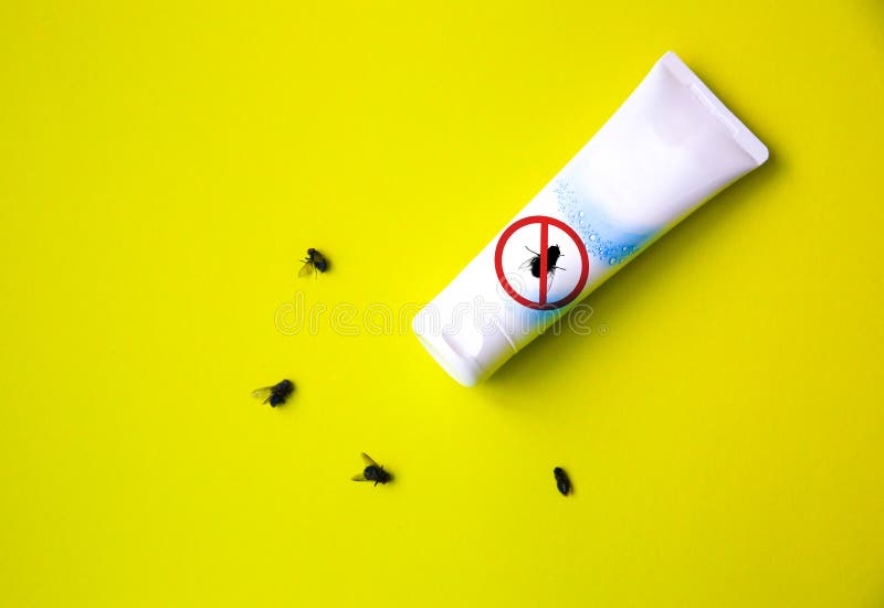 Insect Repellent Cream is Lying in the Table Near Dead Flies Stock ...