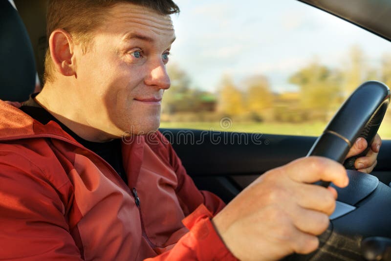 Insecure Young Driver Behind the Wheel. Close-up. Stock Image - Image ...