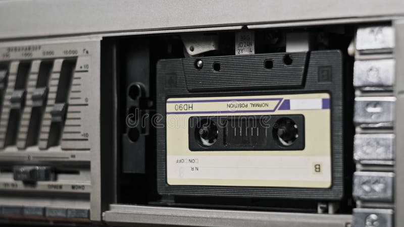 Insert an Audio Cassette in a Tape Recorder and Play, Eject, Close-Up ...