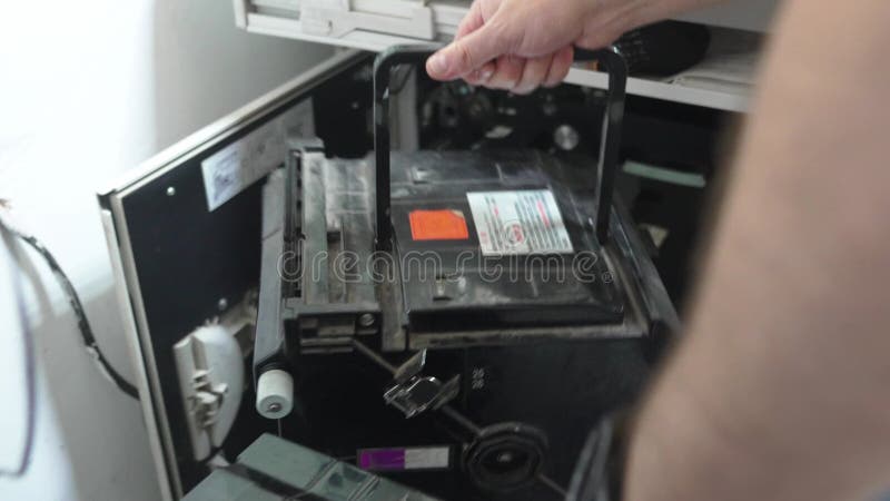 Insert Photo Paper into the Printer To Print Photos. Printer Stock ...