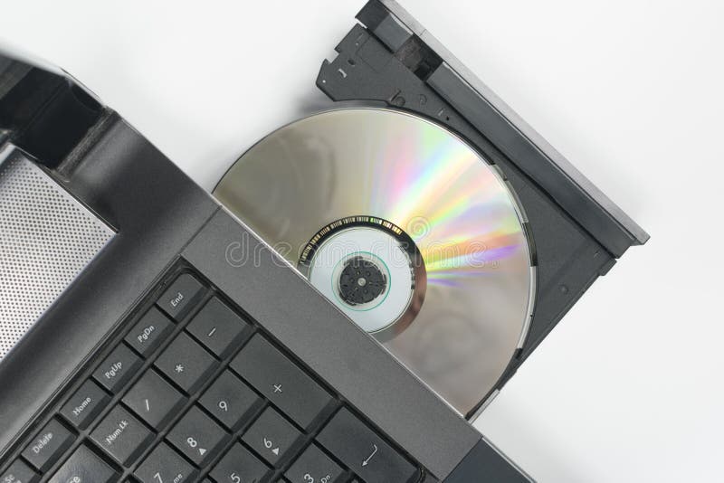 Insert disk into laptop stock image. Image of notebook - 113367669