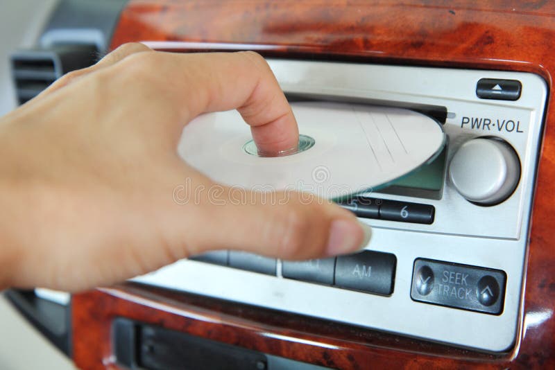 Insert disk to car audio stock photo. Image of system - 68239414