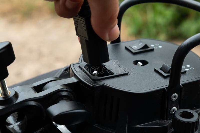 Insert the Power Cable into the Electrical Equipment Stock Photo ...