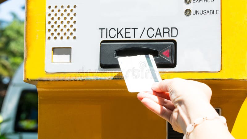 Insert ticket to a machine stock image. Image of hold - 7144323