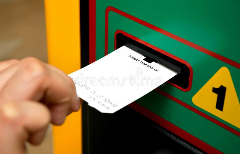Insert ticket to a machine stock image. Image of hold - 7144323