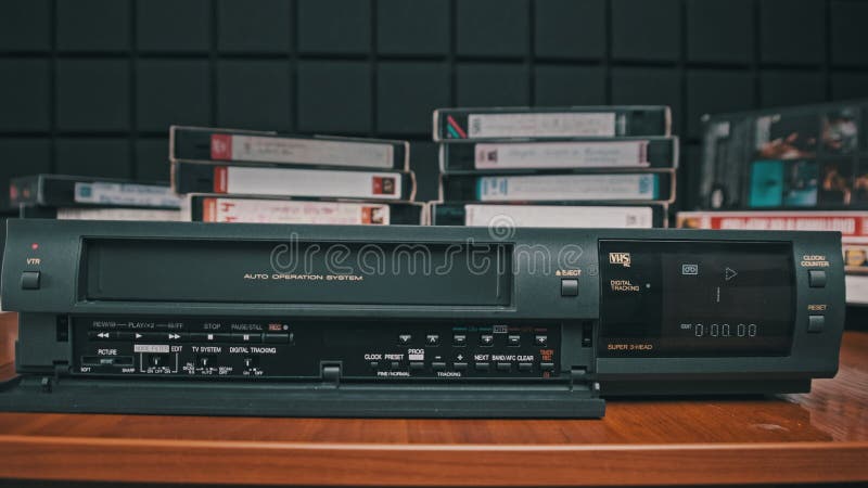 Insert VHS Cassette into VCR and Push Play Button Stock Footage - Video ...