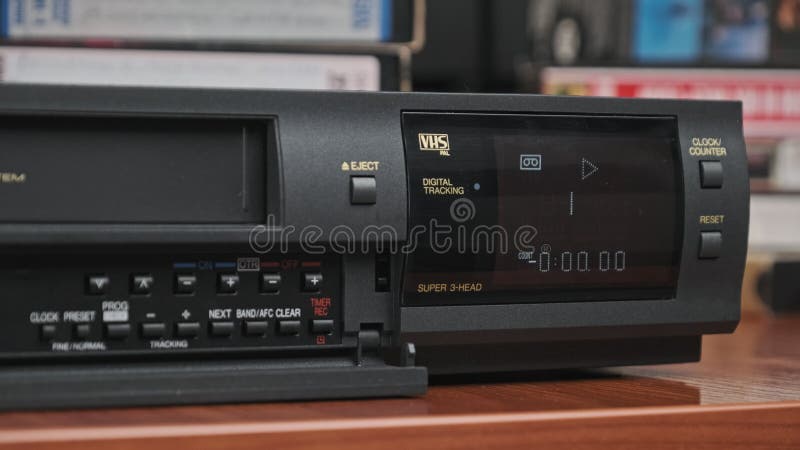 Insert VHS Cassette into VCR and Push Play Button Stock Footage - Video ...