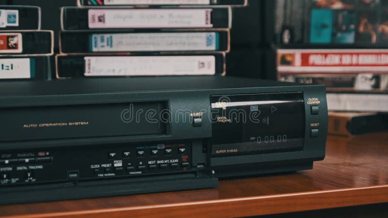 Insert VHS Cassette into VCR and Push Play Button Stock Video - Video ...