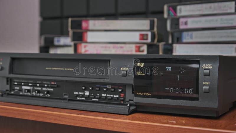Insert VHS Cassette into VCR and Push Play Button Stock Footage - Video ...
