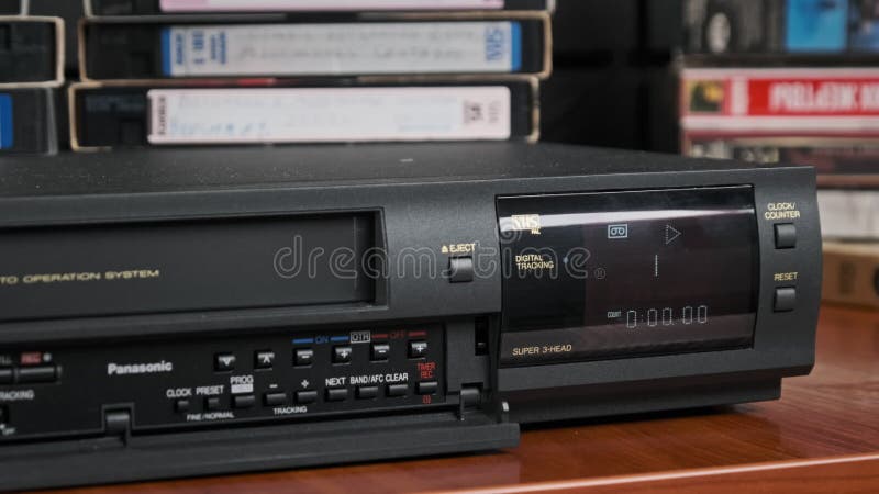 Insert VHS Cassette into VCR and Push Play Button Stock Video - Video ...