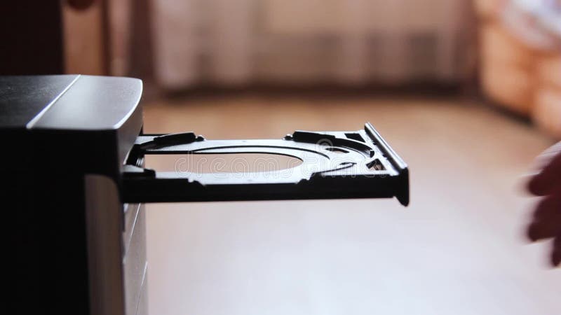 Inserting a Blank CD or DVD into a Laptop Computer Stock Video - Video ...