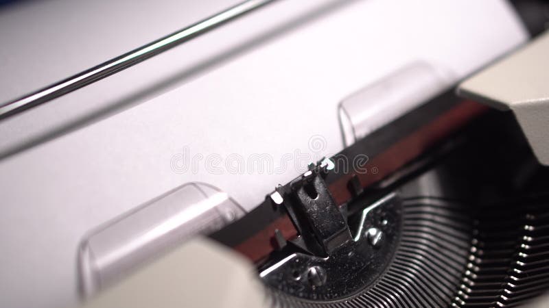 Inserting Blank White Paper in Vintage Typewriter, Close Up Stock ...