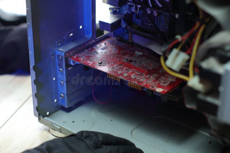 Inserting an Old Graphics Card into a Computer Stock Photo - Image of ...