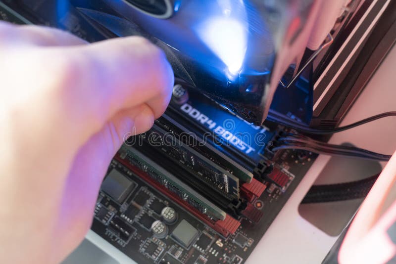 The Inserting Plug in the Ram Ddr Memory Card in the Computer Mainboard ...