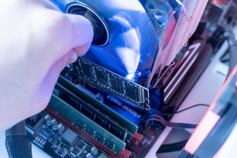 The Inserting Plug in the Ram Ddr Memory Card in the Computer Mainboard ...