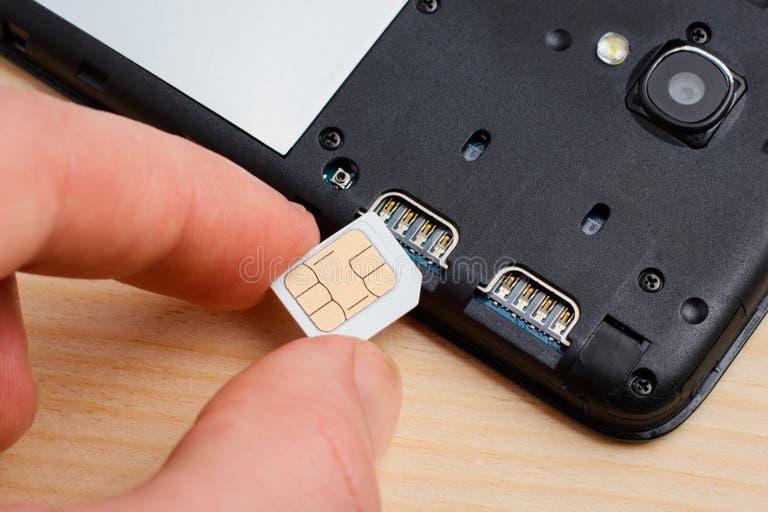 Inserting SIM card stock image. Image of hardware, communication ...