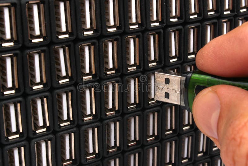 Hand Inserting USB Flash Drive in One of Many Sockets Stock Image ...