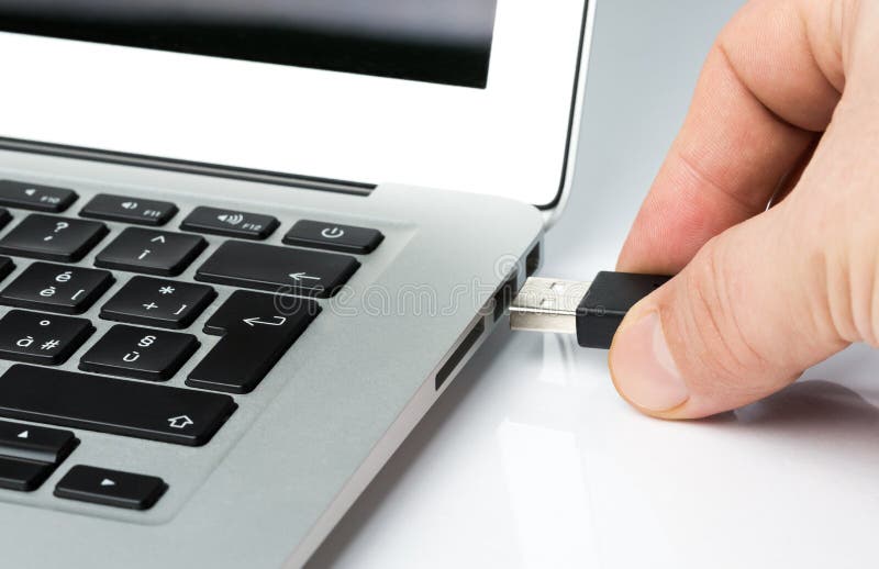 Inserting Usb Key or Cable into a Laptop Computer Stock Image - Image ...
