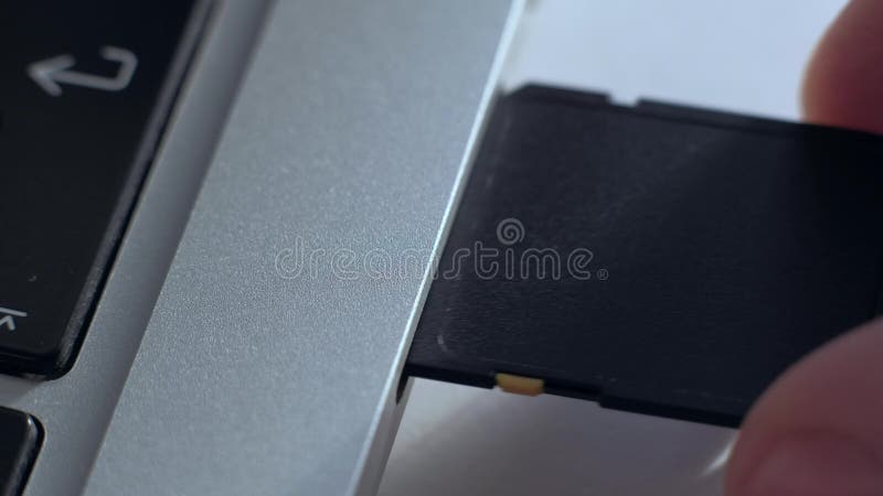 Inserts the SD Card into the Laptop Stock Video - Video of docking ...
