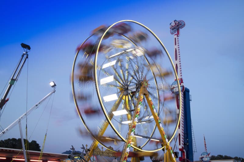 Inside an Amusement Park the Colors of the Ferris Wheel Stock Image ...