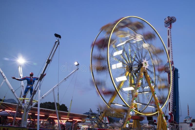 Inside an Amusement Park the Colors of the Ferris Wheel Stock Image ...