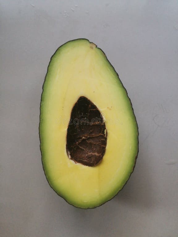 Inside avocado fruit stock photo. Image of avocado, avocada - 215039822