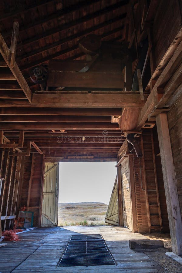 The Inside of a Barn with a Large Open Doorway Stock Photo - Image of ...