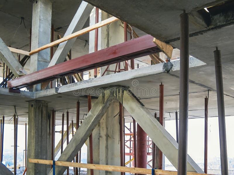 Concrete Beams, Columns and Working Crane of Building Under ...